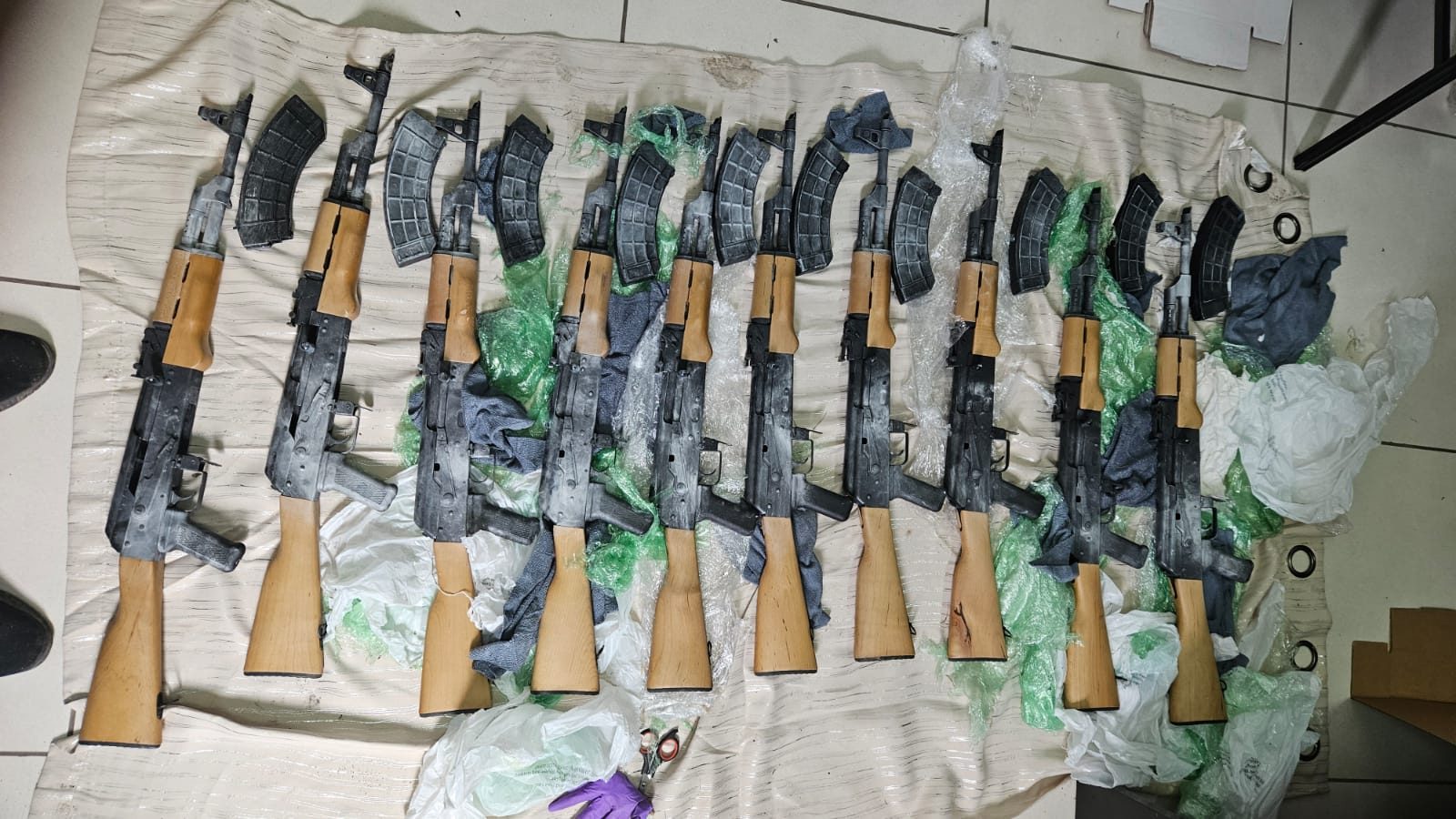 Taxi driver remanded over dumping of AK-47 rifles in Berbice - INews Guyana